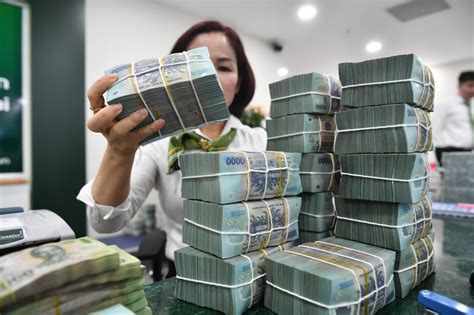 Lãi suất cho vay không giảm kịp theo lãi huy động Tạp chí Tài chính