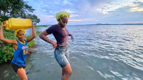 African Village Lifestylelovis256 Taking Outdoor Bath In The Lake