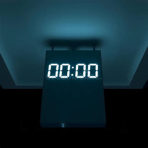 Midnight Digital Clock With Blue Light Against A Dark Background Reset And Renewal Stock Image