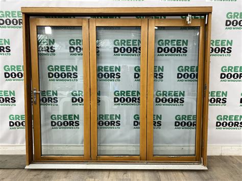 Wooden Veneer Brown Bi Folding Doors Green Doors