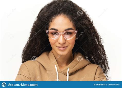Gorgeous 20s Multiracial Lady Wearing Glasses Looks At The Camera With