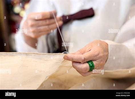A Master Of Traditional Korean Clothing A Hanbok Expert Is Sewing For