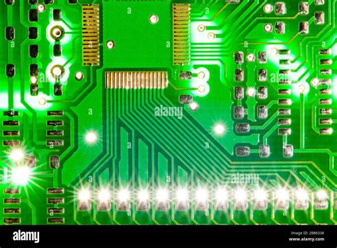 Close Up Photo Of Pcb Printed Circuit Board Electric With Light Flash Behind Stock Photo Alamy