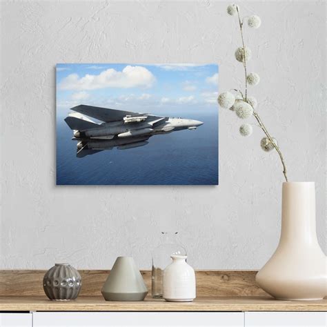 An F14d Tomcat Banks With Its Tailhook Lowered In Preparation For Landing Wall Art Canvas