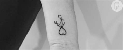 Marília Mendonça faz nova tatuagem e explica trecho de filme Saiba Purepeople