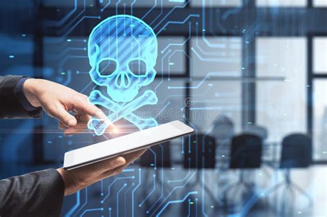 Close Up Of Male Hands Using Pad With Glowing Skull Hologram On Blurry Office Interior