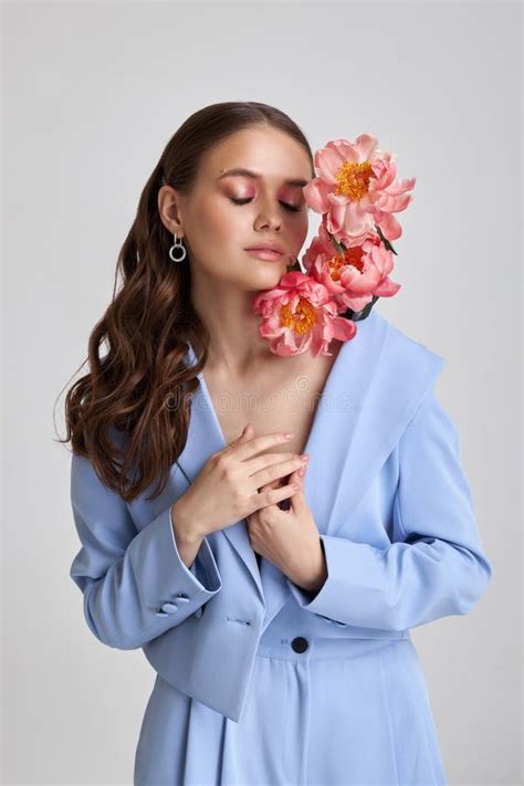 Woman Lying On The Floor In A Black Bodysuit Studio Portrait Perfect Body The Figure Of A