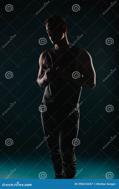 With Strong Muscles And A Determined Attitude A Fit Man Shows Off His Transformation And