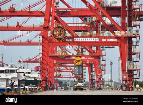 Nanjing China June 12 2023 Trucks Deliver Containers At The