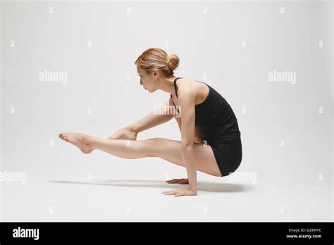 Attractive Young Japanese Woman Wearing Black Pants And Tank Top