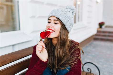 Free Photo Closeup View Of Woman Licking Lollipop Pinup Girl With