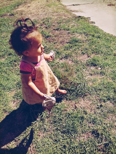 Premium Photo Girl On Field