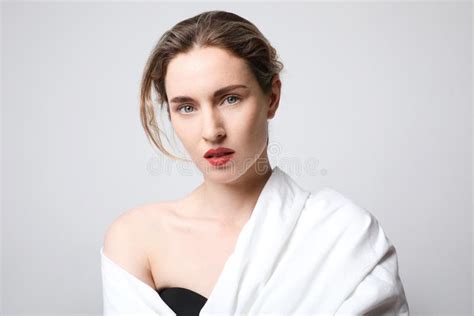 Beauty Portrait Of Young Woman With Red Lips Wearing White Clothing