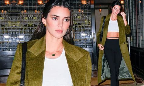 Kendall Jenner Showcases Her Flat Midriff In Crop Top And Trousers With Olive Duster Coat In Nyc