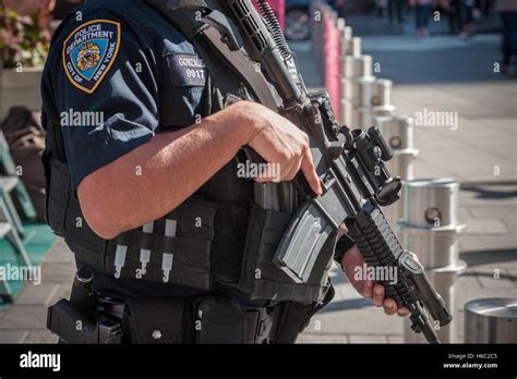 Nypd Counterterrorism Officers Walk Through Times Square In New York On