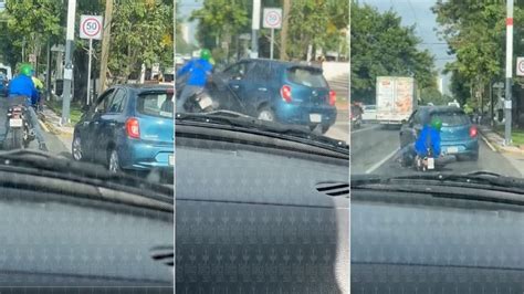 VIDEO Conductor arrolla a motociclista y huye acto detona polémica