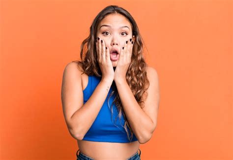 Premium Photo Feeling Shocked And Scared Looking Terrified With Open