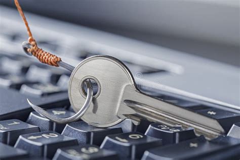 phishing hacking personal data and money key and hook on computer