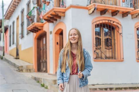 Female Tourist Walks Through The Colonial Streets San Cristobal De Las