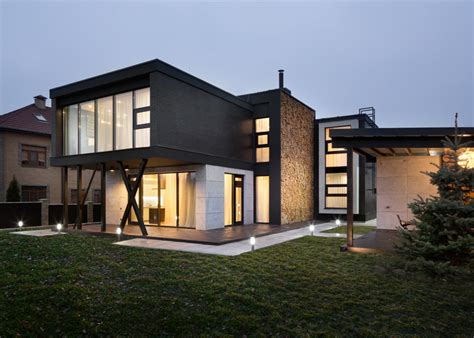 House By Sergey Makno Combines A Staircase With A Bookcase
