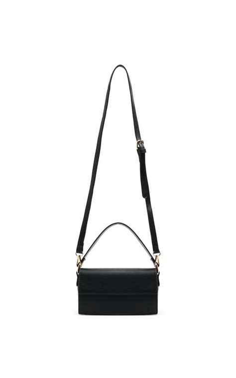 mala torbica boja crno cropp 588dd 99x