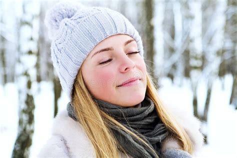 The Young Beautiful Girl Is Photographed In The Cold Winter In Park
