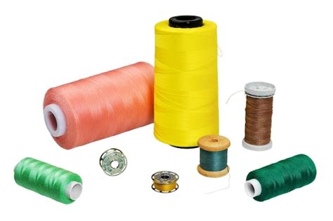 Premium Photo Thread Spools On White