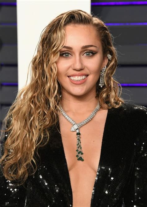 Miley Cyrus Thefappening Sexy Sideboobs At Oscar Party The Fappening