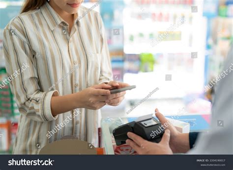 Asian Girl Payment By Scan Qr Stock Photo 2204190017 Shutterstock