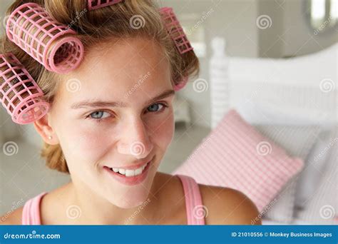 Teenage Girl With Hair In Pink Curlers Royalty Free Stock Image Image