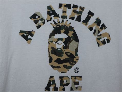 Bape Kaws X Bape 1st Camo Skullsta Bendy Ape Head Logo Tee 05 07 Grailed
