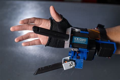 Hand Augmented By Set Of Two Supernumerary Robotic Fingers Download