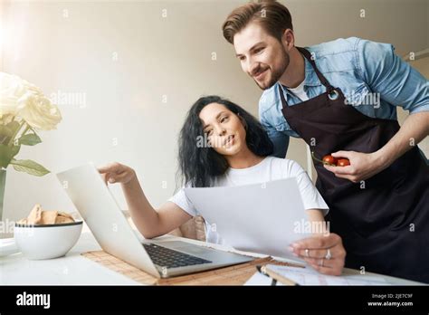 Female And Male Staring At Laptop Screen Stock Photo Alamy