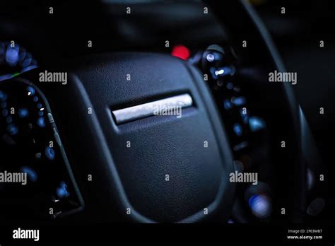 Black Leather Multi Function Steering Wheel In The Interior Of A