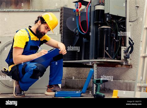 Qualified Worker Commissioned For Outside Air Conditioner Annual