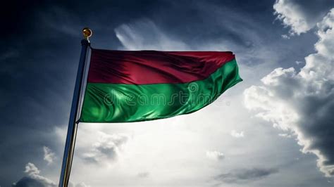 A Flag Of Madagascar Waving In The Wind Against A Dramatic Cloudy Sky Stock Footage Video Of