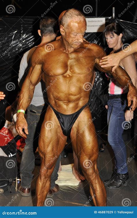 Male Bodybuilding Contestant Showing His Chest Pose Editorial Image