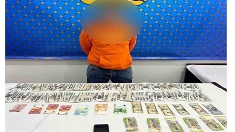 بالصورة تاجر النقد الأجنبى خارج السوق المصرفى فى قبضة مباحث القاهرة