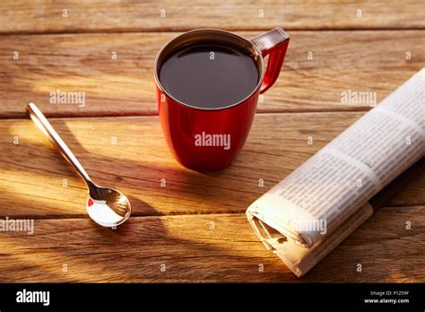 Coffee Red Cup Newspaper Morning Breakfast On Vintage Wooden Table