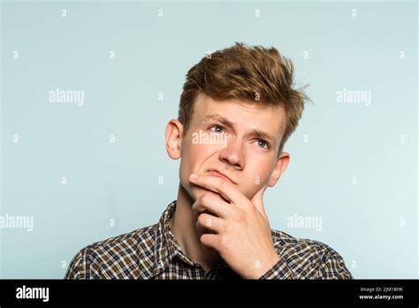 Puzzled Confused Man Scratch Chin Thinking Stock Photo Alamy