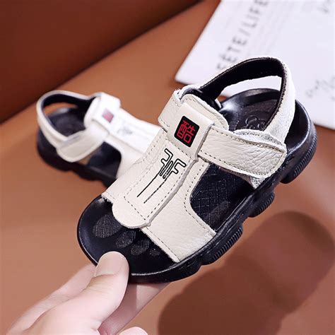 真皮男童凉鞋新款韩版防滑软底男宝宝凉鞋小男孩凉鞋1 6岁沙滩鞋虎窝淘