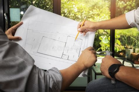 Confident Team Of Architect Working Together In A Office They Discussing About New Startup