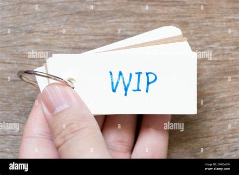 Hand Hold Flash Card With Handwriting In Word Wip Abbreviation Of Work