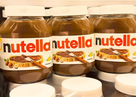 Nutella Jars On Shelf With Hazelnut Spread Packaging Close Up Editorial