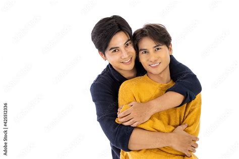 Portrait Of Young Cute Asian Gay Couple Love And Hugging With Smiling