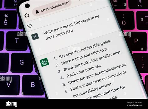 OPEN AI ChatGPT Chat Seen On Smartphone Placed On Laptop AI