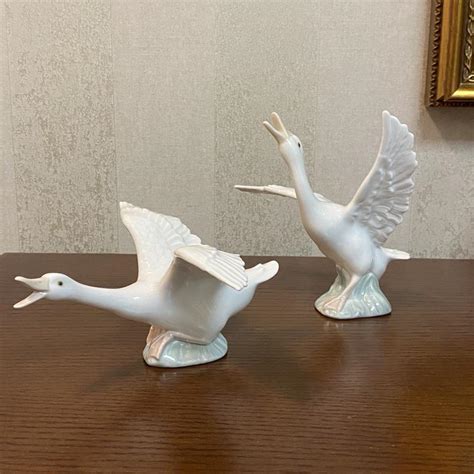 2 фарфоровые статуэтки Lladro взлетающие гуси — цена 2500 грн в каталоге Статуэтки Купить