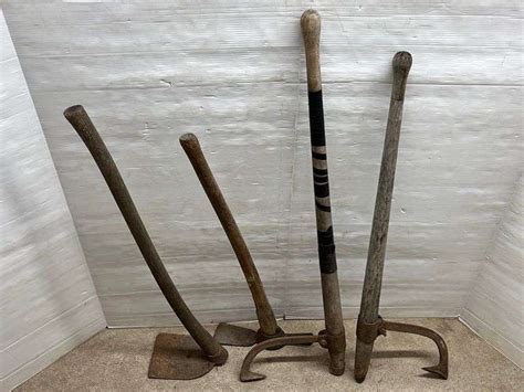 2 Antique Log Rollers 1 Antique Grub Axe Hoe And 1 Pick Mattock