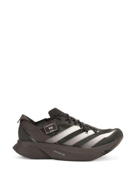 Y Adizero Adios Pro Lace Up Sneakers In Black For Men Lyst Uk