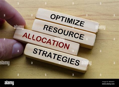 Optimize Resource Allocation Strategies Text On Wooden Blocks